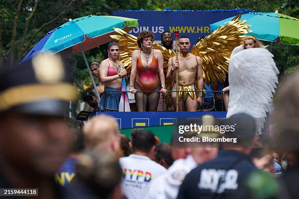 Members Of The Human Rights Campaign Pride Float Watch As New York