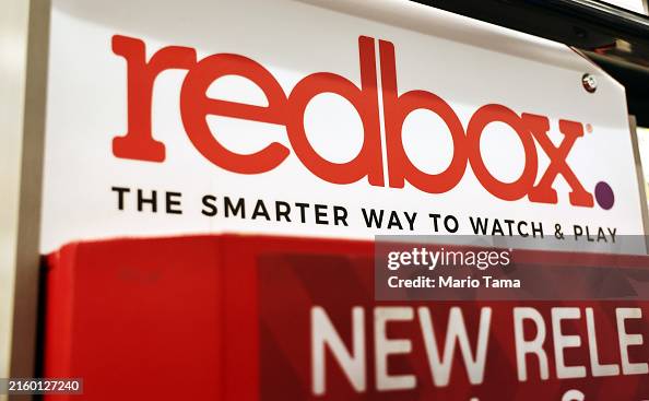 A Redbox movie rental kiosk stands inside a Walgreens store on July ... A Redbox movie rental kiosk stands inside a Walgreens store on July ...
