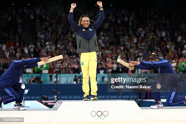 Gold medalist Rebeca Andrade of Team Brazil, silver medalist Simone ... Gold medalist Rebeca Andrade of Team Brazil, silver medalist Simone ...