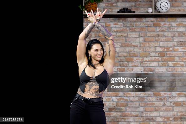 Rhea Ripley appears onstage during the Fanatics Fest NYC 2024 at ... Rhea Ripley appears onstage during the Fanatics Fest NYC 2024 at ...