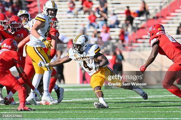 Running back Harrison Waylee of the Wyoming Cowboys runs for yardage ... Running back Harrison Waylee of the Wyoming Cowboys runs for yardage ...