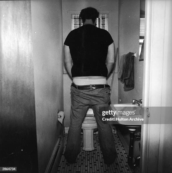 Rear View Of A Man Standing In A Toliet And Urinating Circa 1960s Photo Dactualité Getty Images