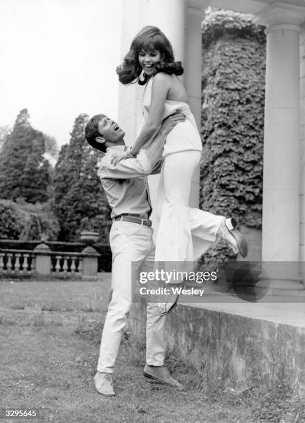 British Pop Singer And Actor Cliff Richard Has Some Fun With Vivienne