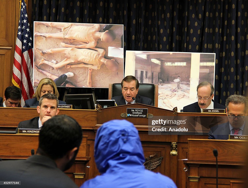 Syrian Army Defector Known As Caesar In A Blue Hooded Jacket Who