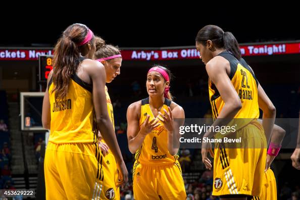 Skylar Diggins Of The Tulsa Shock Huddles With Teammates Against The