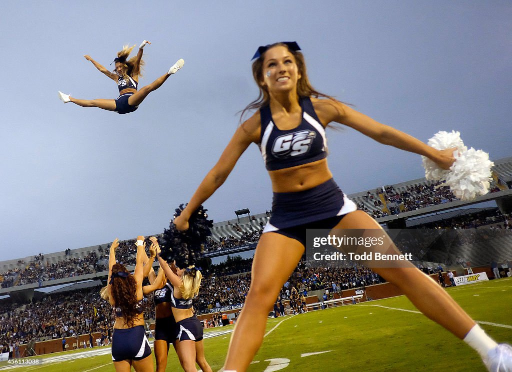 Cheerleaders With The Georgia Southern Eagles Perform A Stunt Before