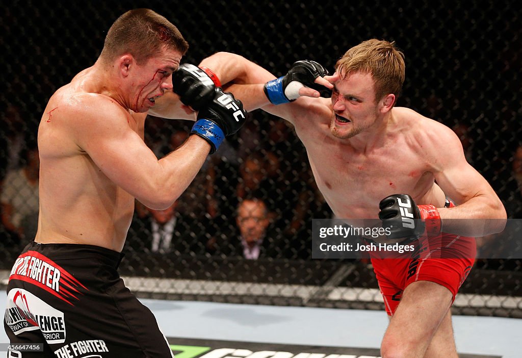 Gunnar Nelson Of Iceland Punches Rick Story In Their Welterweight