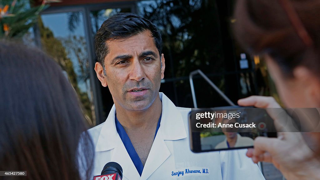 Doctor Sanjay K Khurana Talks Outside His Office Building March 6
