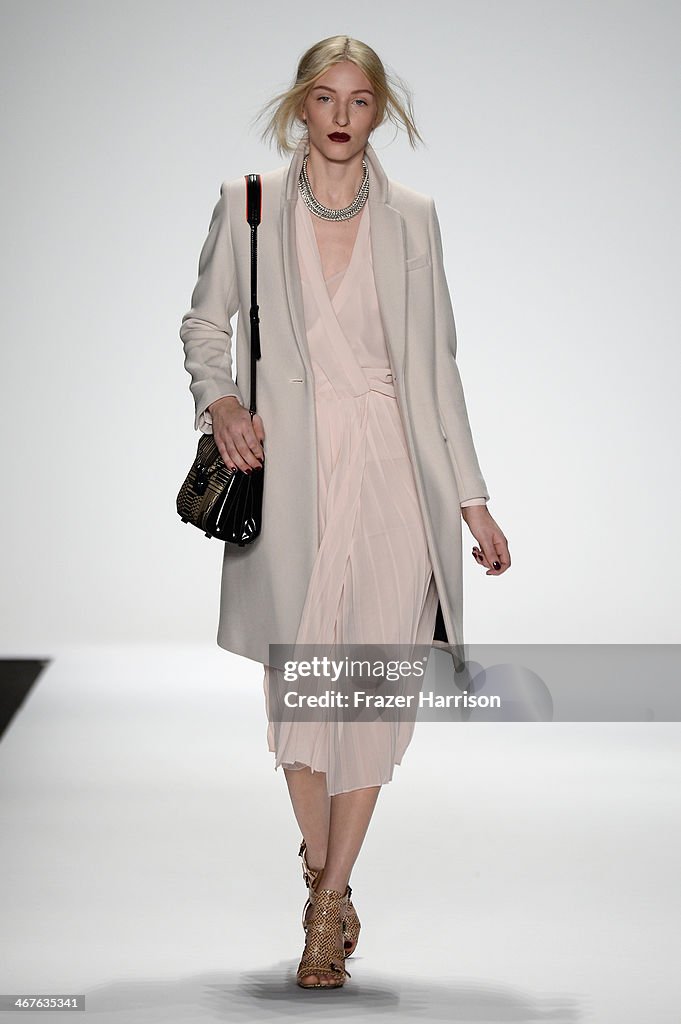 A Model Walks The Runway At Rebecca Minkoff Fashion Show During News