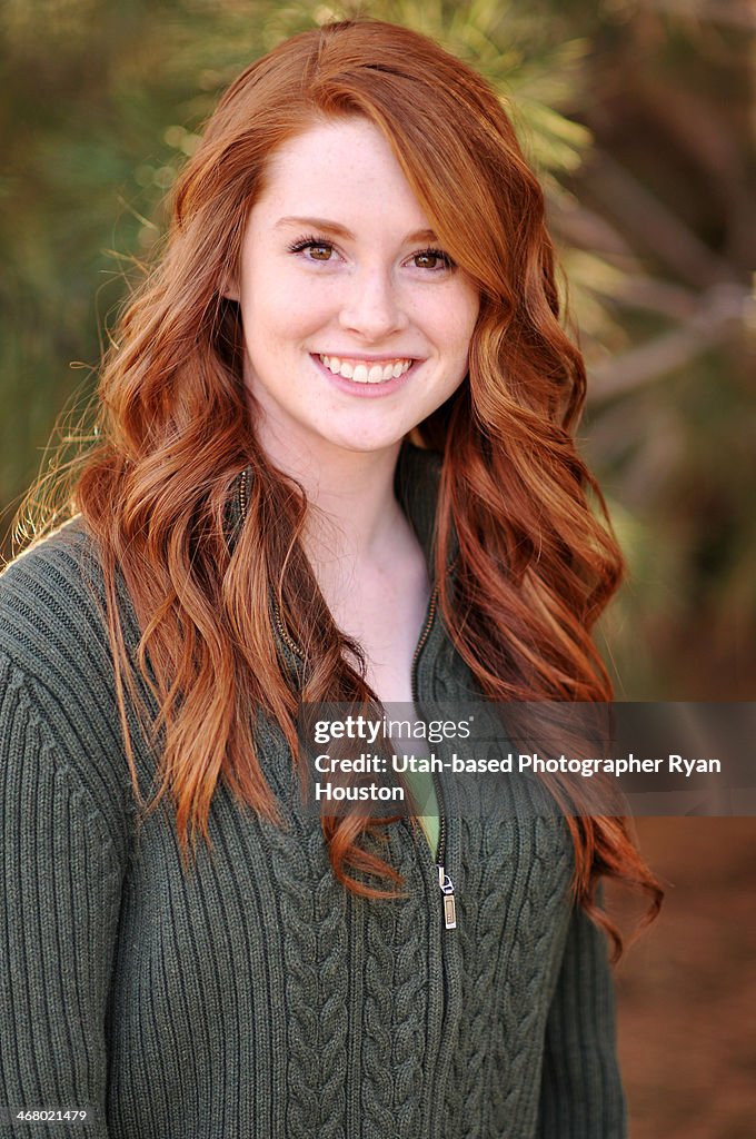 Redhead Model In Dark Green Sweater Photo Getty Images