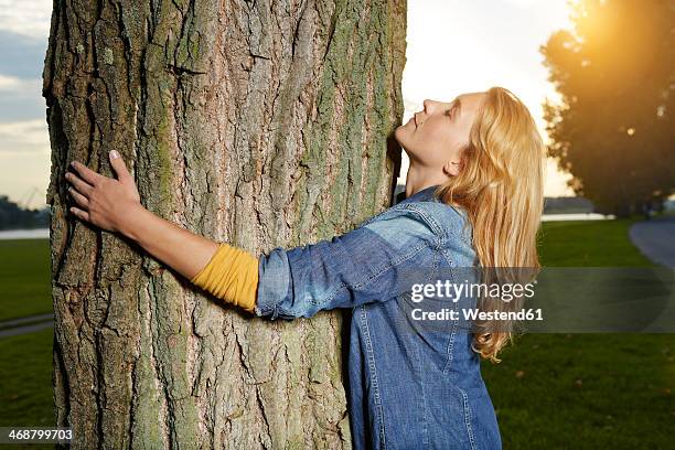 Tree Hugging Woman Photos And Premium High Res Pictures Getty Images