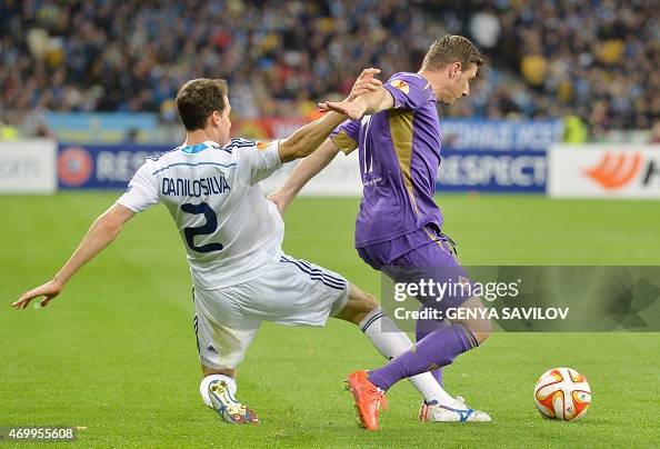 Danilo Silva of FC Dynamo Kyiv fight for a ball against Joaquin of ... Danilo Silva of FC Dynamo Kyiv fight for a ball against Joaquin of ...