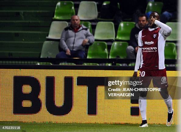 Metz' Malian forward Modibo Maiga celebrates after scoring during the ... Metz' Malian forward Modibo Maiga celebrates after scoring during the ...