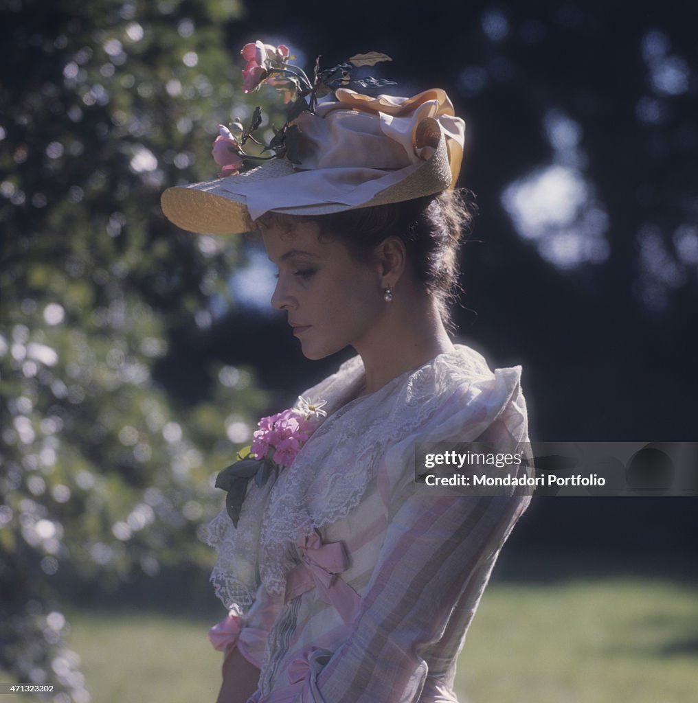 Italian Actress Laura Antonelli Posing In A Stage Costume And Hat In