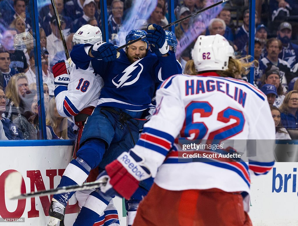 Brenden Morrow Of The Tampa Bay Lightning Checks Marc Staal Of The