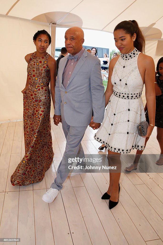Russell Simmons And His Daughters Aoki Lee And Ming Lee Arrive As
