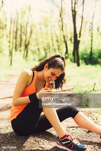 Young Woman Sitting Hugging Her Knee Photos Et Images De Collection