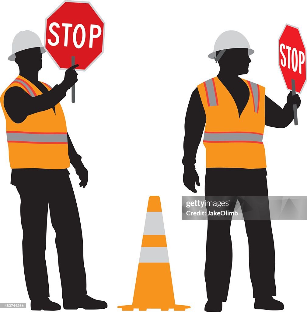 Construction Worker Holding Stop Sign On City Street Stock Construction Worker Holding Stop Sign On City Street Stock
