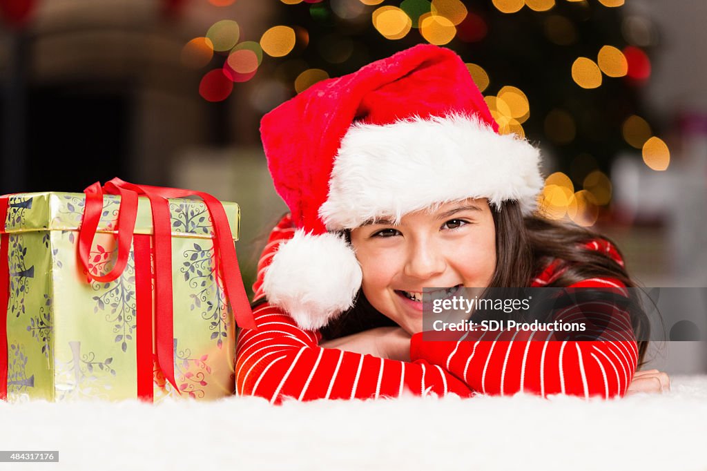 Adorable Preteen Girl Waiting To Open T On Christmas Morning High