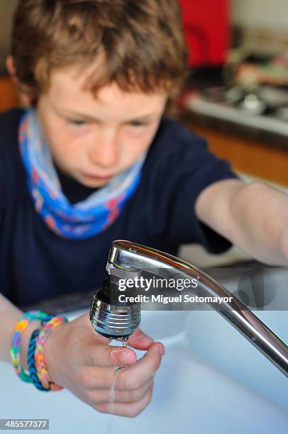 50 Child Turning Off Tap Stock Photos, High-Res Pictures, and Images ... 50 Child Turning Off Tap Stock Photos, High-Res Pictures, and Images ...