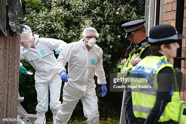 Police Continue To Search Properties In Connection With The Murder Of