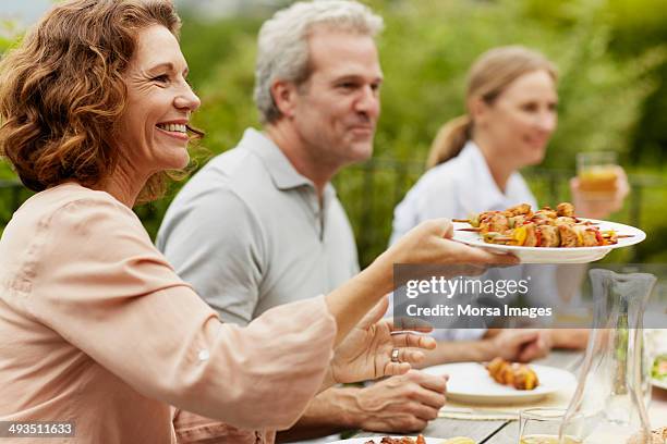 Pass Food Table Photos And Premium High Res Pictures Getty Images