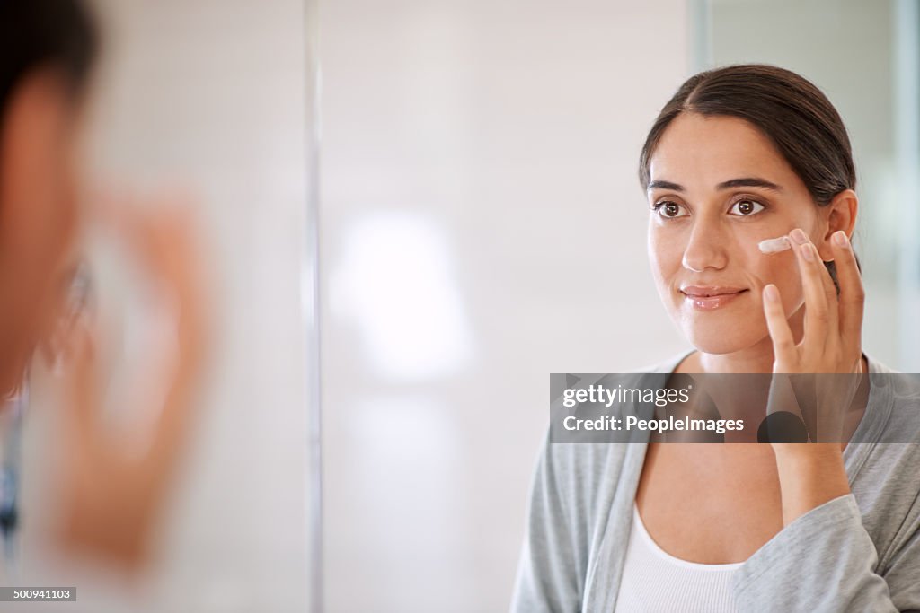 Keeping Her Skin Soft And Smooth High-Res Stock Photo - Getty Images Keeping Her Skin Soft And Smooth High-Res Stock Photo - Getty Images