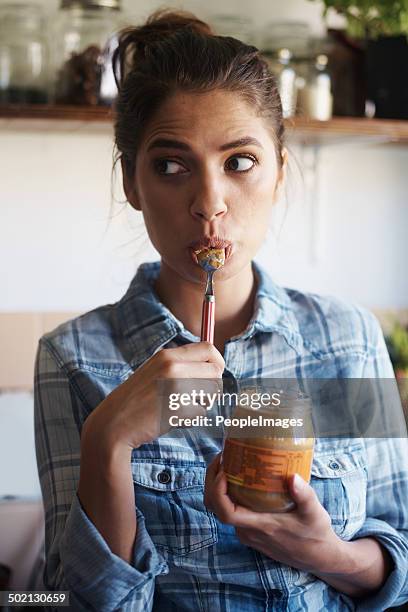 Adult Licking Spoon Fotografías E Imágenes De Stock Getty Images