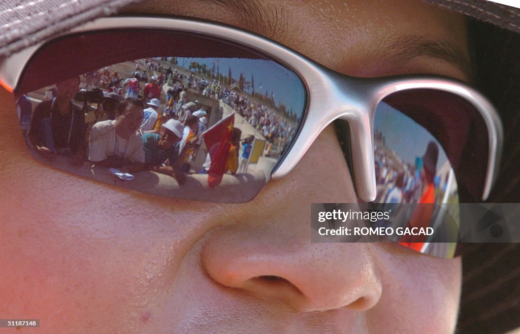 Chinese Female Archer Zhang Juanjuan Wearing Sunglasses Looks At A News Photo Getty Images