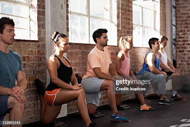 Kneeling Stretch Fotografías E Imágenes De Stock Getty Images