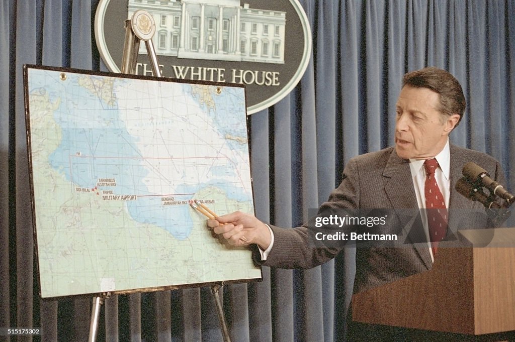 Secretary of Defense Caspar Weinberger uses a map to explain the U.S ... Secretary of Defense Caspar Weinberger uses a map to explain the U.S ...