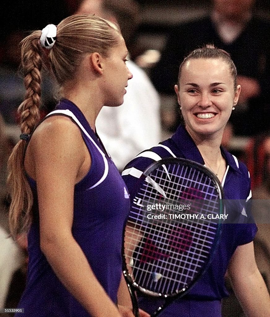 Anna Kournikova Of Russia And Martina Hingis Of Switzerland Talk Over