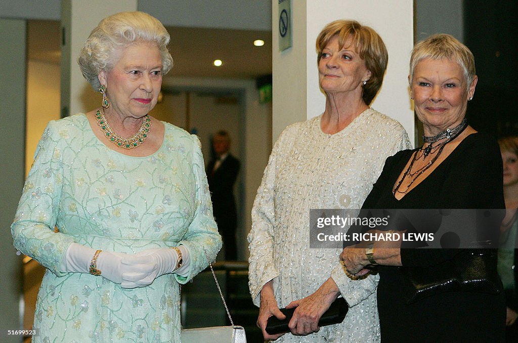 Queen Elizabeth Ii Walks Past Dame Maggie Smith And Dame Judi Dench