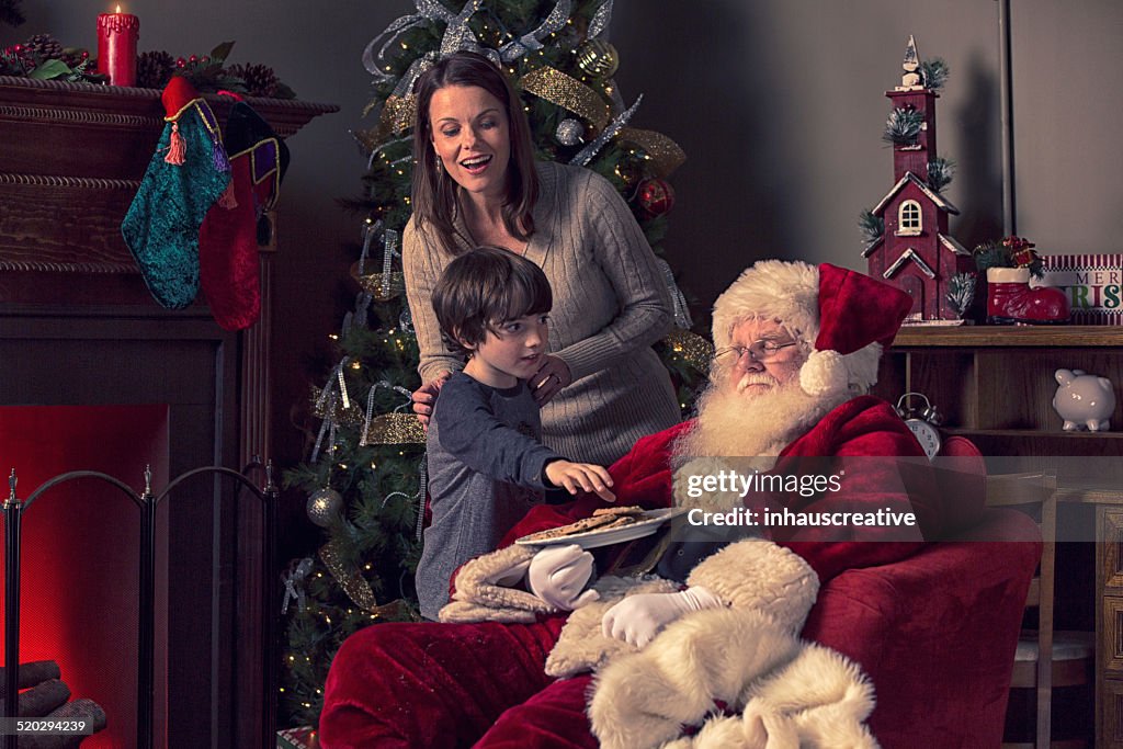 Mom And Son Sneaking Up On Sleeping Santa High-Res Stock Photo - Getty ... Mom And Son Sneaking Up On Sleeping Santa High-Res Stock Photo - Getty ...