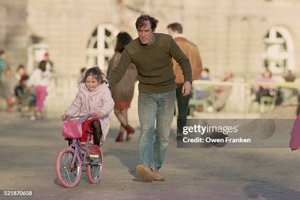Dad Teach Daughter To Ride Bicycle Photos And Premium High Res Pictures