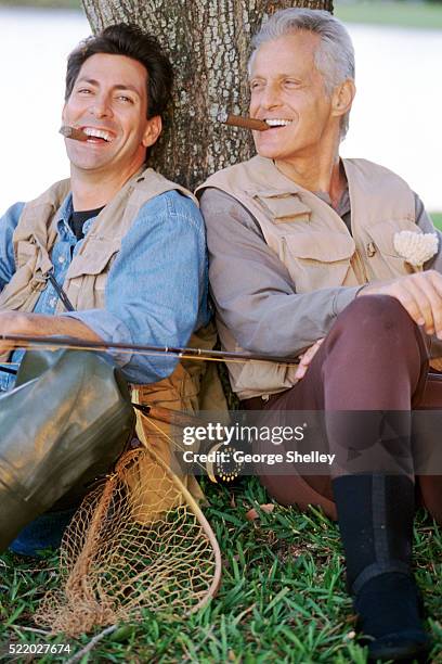 Father Son Smoking Photos And Premium High Res Pictures Getty Images