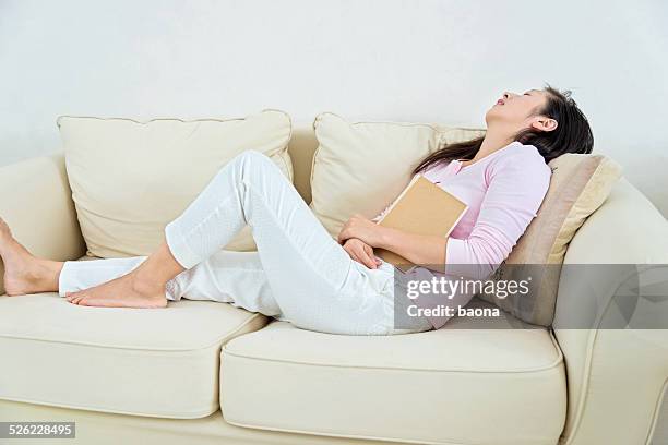 Woman Passed Out On Couch Photos And Premium High Res Pictures Getty Images