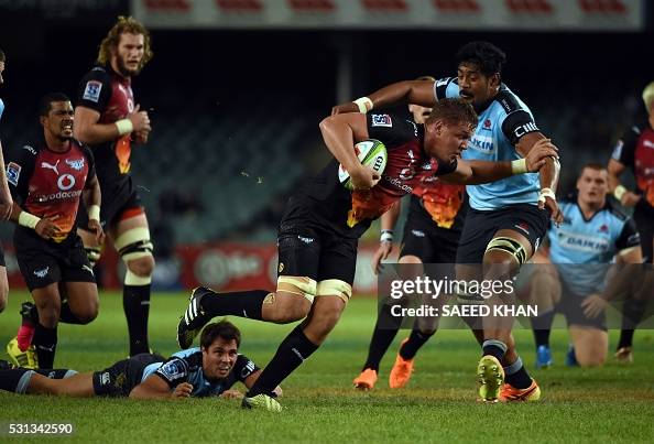 Bulls' Hanro Liebenberg fights off a tackle by NSW Waratahs' Will ... Bulls' Hanro Liebenberg fights off a tackle by NSW Waratahs' Will ...