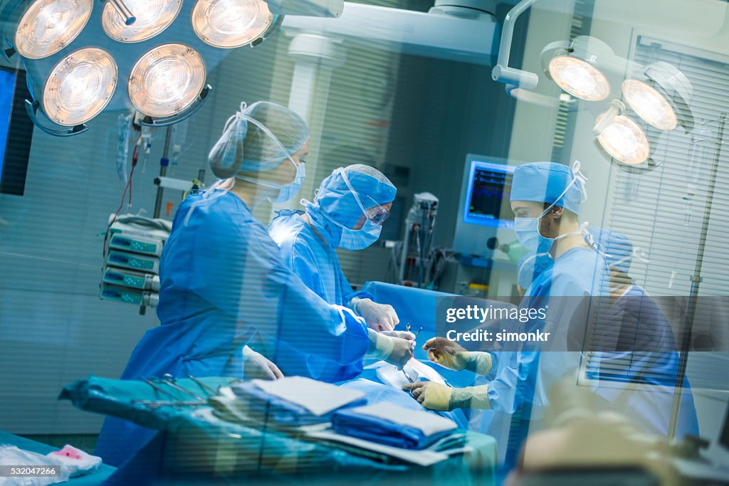 Surgeons Performing Surgery High-Res Stock Photo - Getty Images Surgeons Performing Surgery High-Res Stock Photo - Getty Images