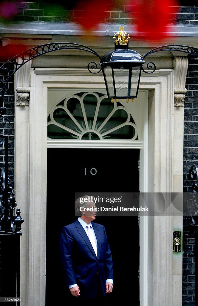 British Prime Minister Tony Blair Waits To Greet Prime Minister John