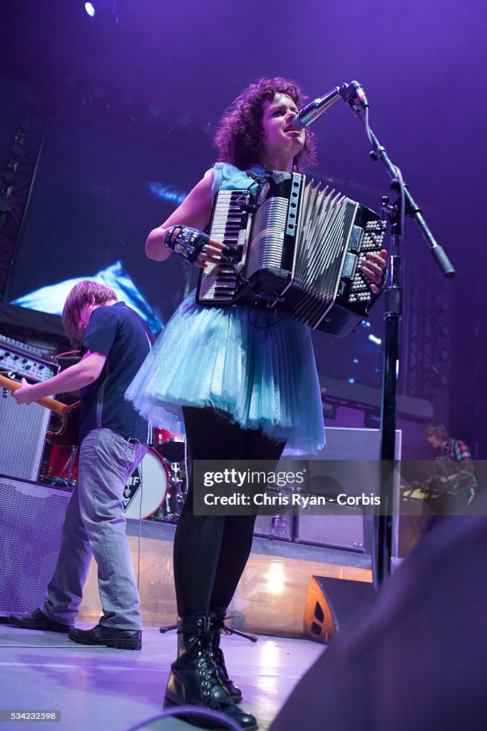 Régine Chassagne Performs On Stage With Arcade Fire During Their