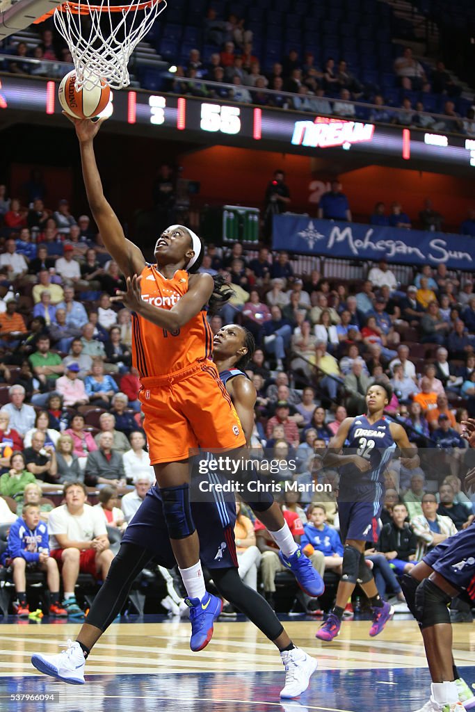Chiney Ogwumike Of The Connecticut Sun Goes For The Layup Against The
