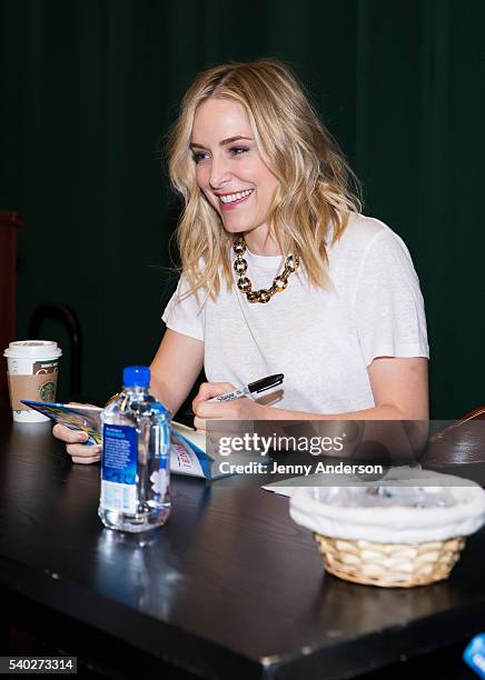 19 Jenny Mollen Signs Copies Of Live Fast Die Hot Photos And High Res Pictures Getty Images