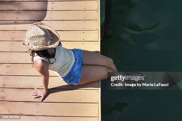 Feet Hanging From Dock Photos And Premium High Res Pictures Getty Images