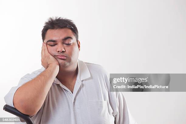 27 Obese Man Sleeping Stock Photos, High-Res Pictures, and Images ... 27 Obese Man Sleeping Stock Photos, High-Res Pictures, and Images ...