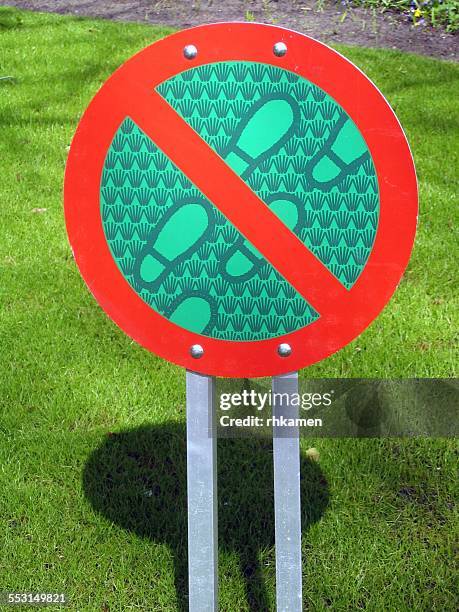Dont Walk On The Grass Sign Photos and Premium High Res Pictures ... Dont Walk On The Grass Sign Photos and Premium High Res Pictures ...