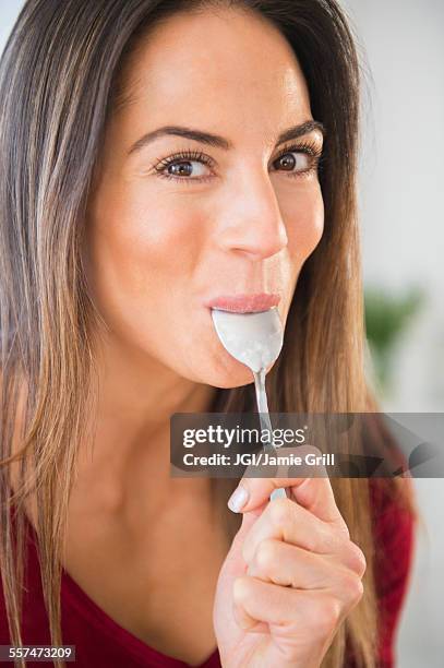 Adult Licking Spoon Fotografías E Imágenes De Stock Getty Images