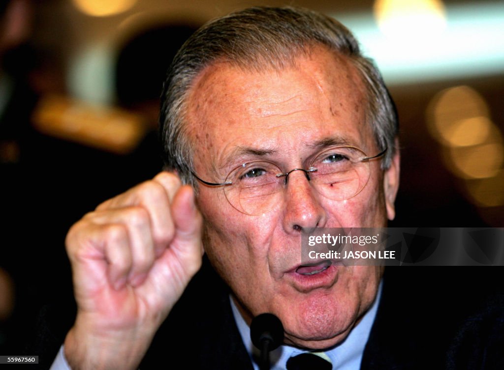 Us Defense Secretary Donald Rumsfeld Speaks During A Symposium At The