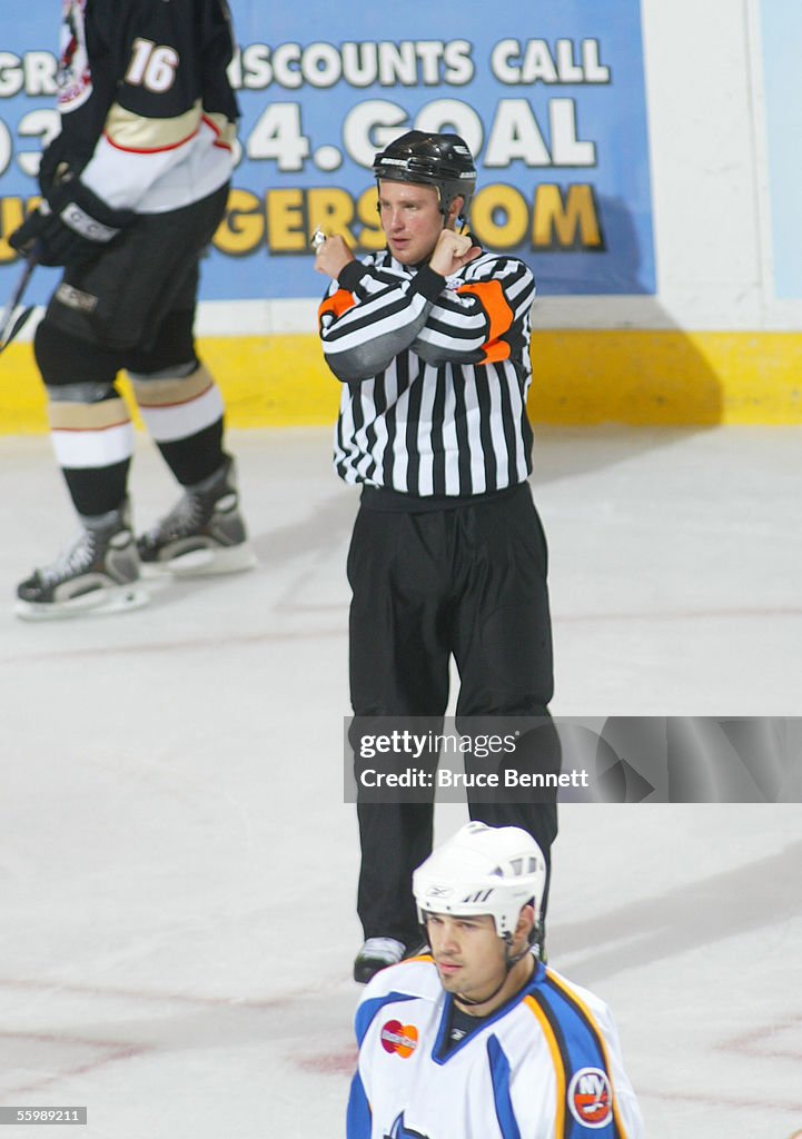 Ryan Fraser, son of NHL referee Kerry Fraser, officiates the American ... Ryan Fraser, son of NHL referee Kerry Fraser, officiates the American ...