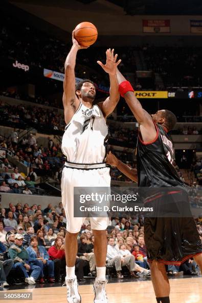 Tim Duncan Of The San Antonio Spurs Shoots Over Steven Hunter Of The
